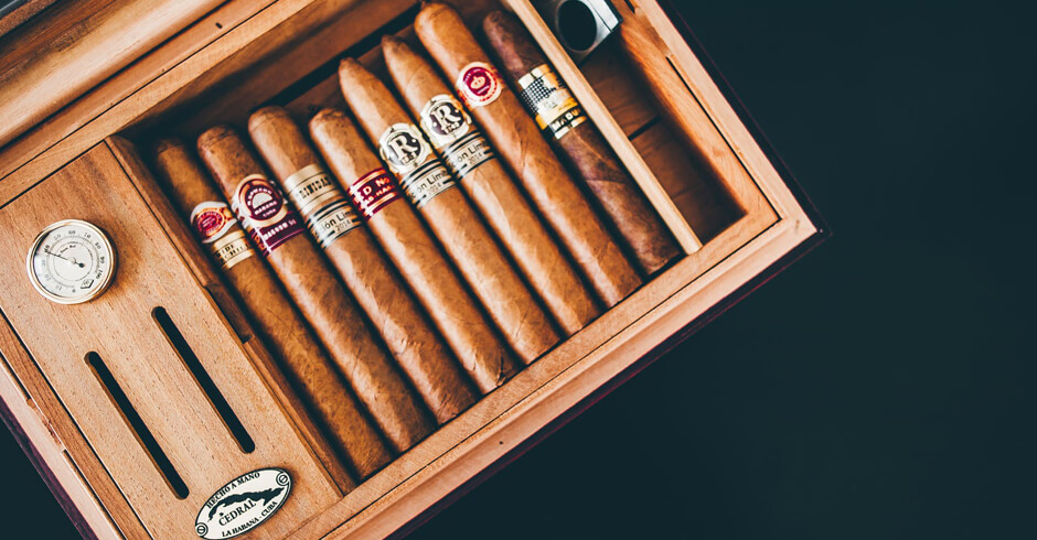 A Brief History of Cigars (And How To Smoke One Like a Pro)